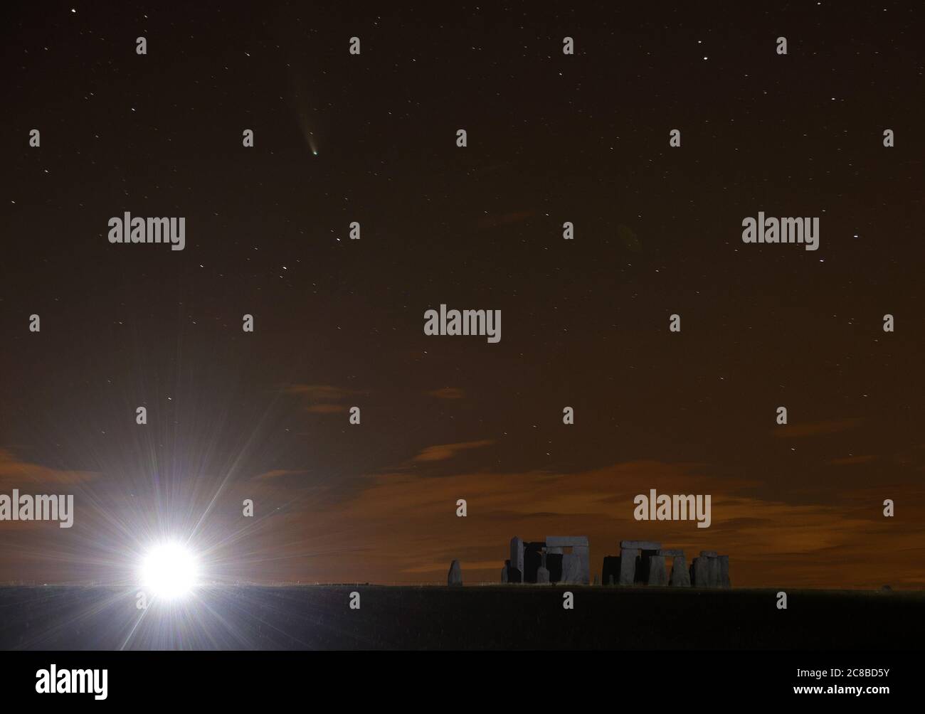 Comet Neowise (top left) appears in the night sky over Stonehenge in ...