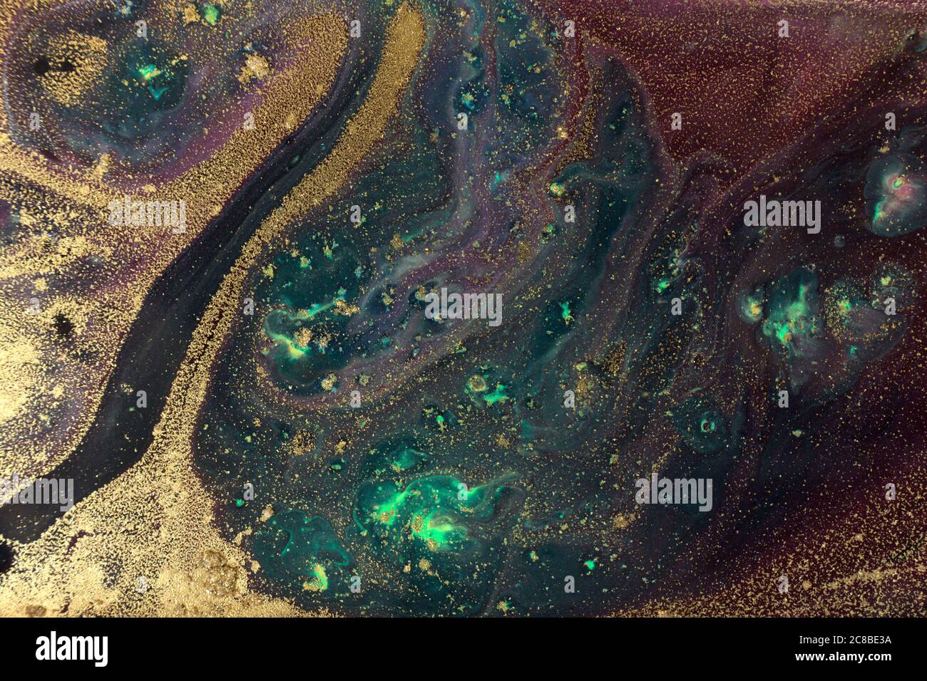 Dark liquid pattern with small golden particles Stock Photo - Alamy