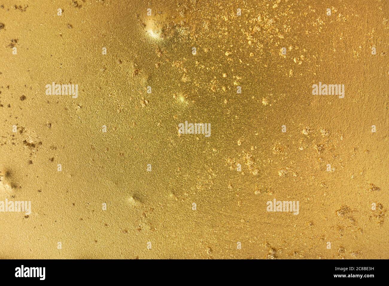 Golden dust background. Sparkling gold texture Stock Photo - Alamy
