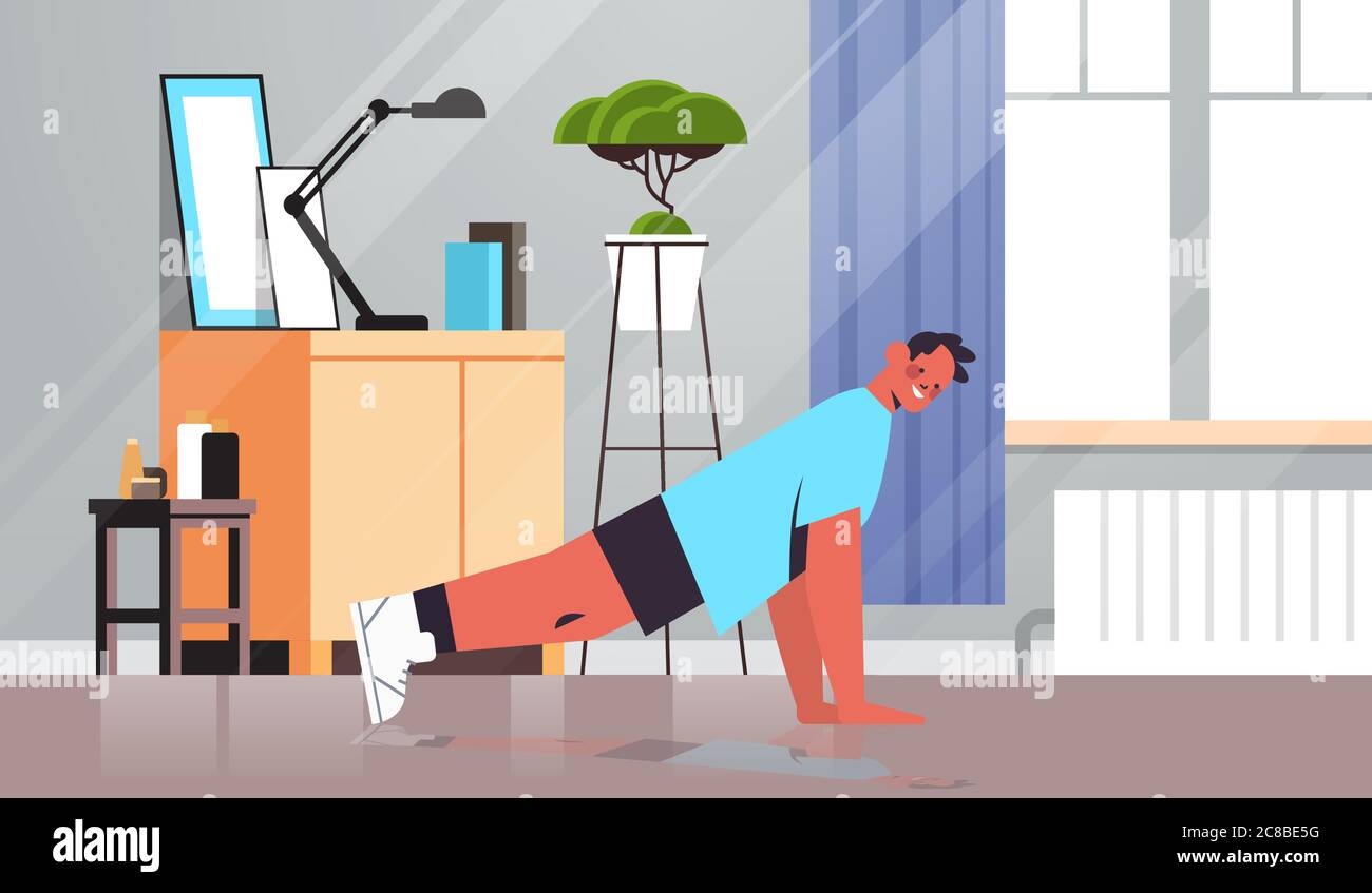 man doing push ups exercises at home guy having workout cardio fitness ...