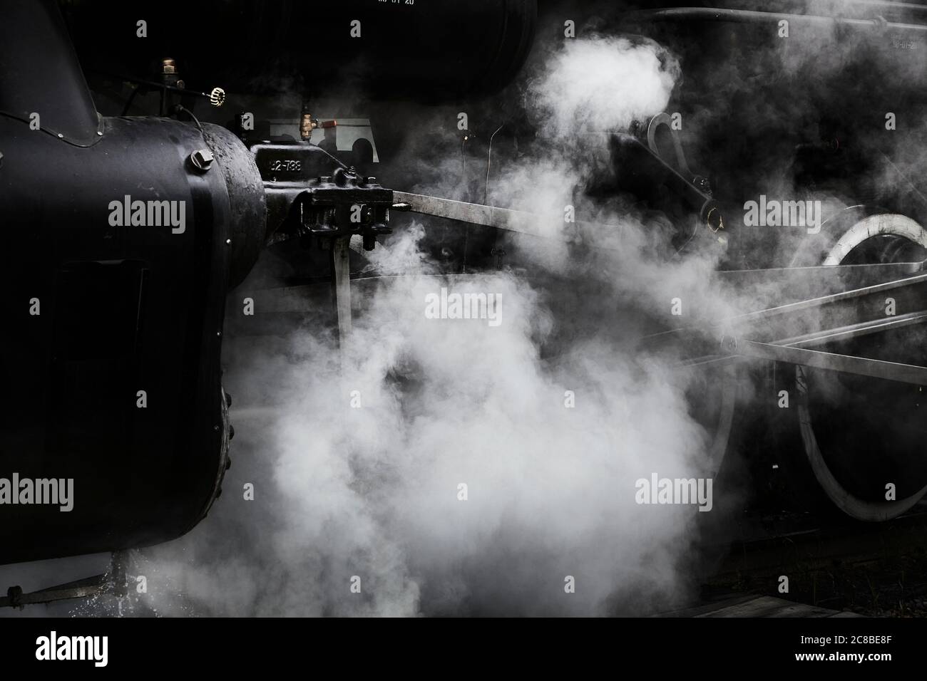 Mechanism of train wheel system emitting steam on rails during stop on ...