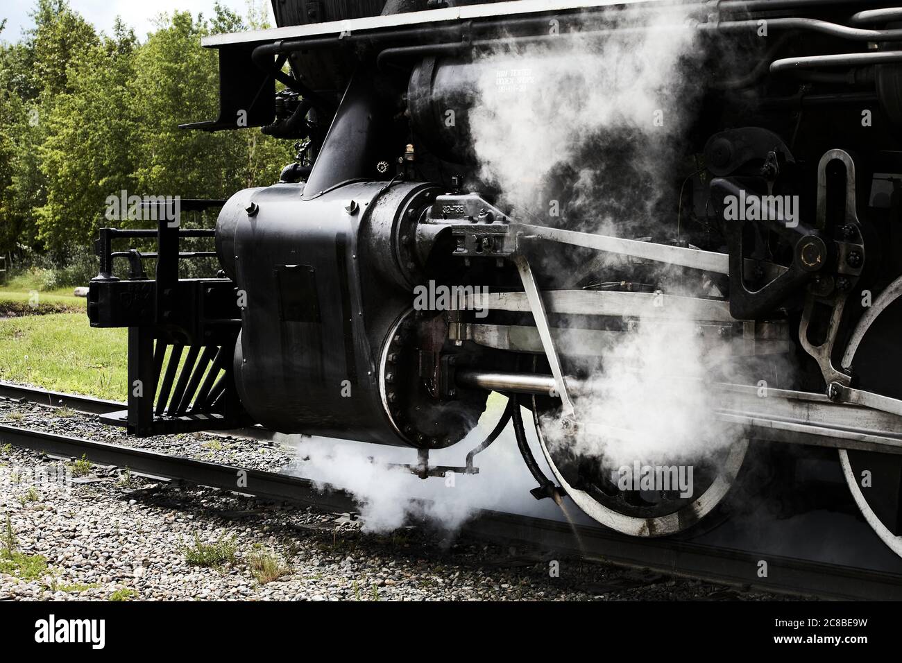 Chugging along with history, an antique steam locomotive gets ready to ...
