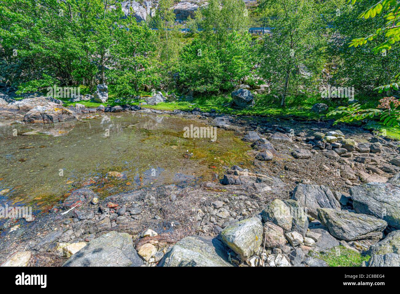 Small and very shallow bay at summer Stock Photo - Alamy