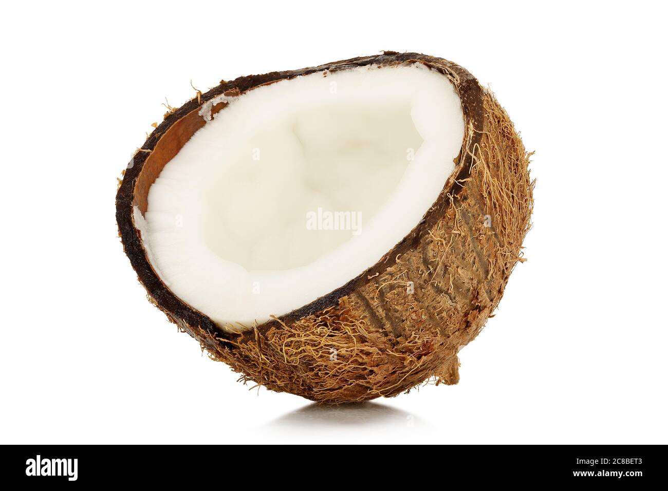 half a coconut isolated on white Stock Photo - Alamy