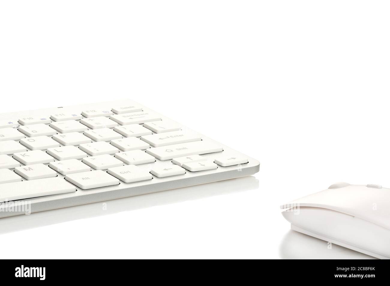 white mouse and keyboard on white surface Stock Photo - Alamy