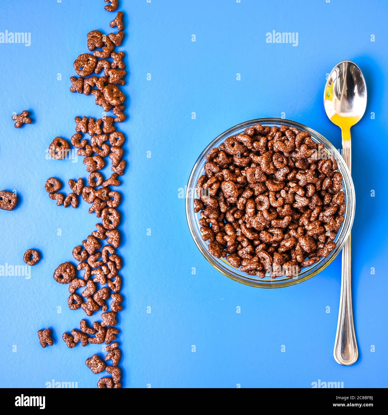 Chocolate cornflakes in the shape of letters of the English alphabet ...