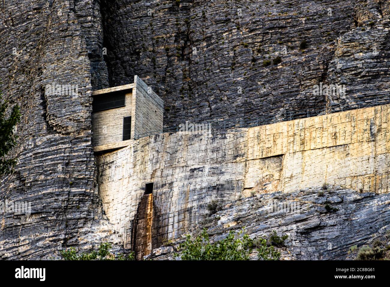 building built into the side of Provo canyon Stock Photo - Alamy