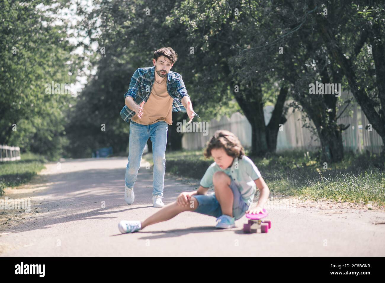 Boy falling ground hi-res stock photography and images - Alamy