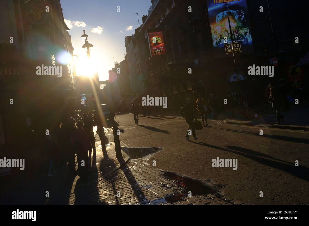 Late afternoon sunlight, Old Compton Street,, London, UK. 18 Feb 2016 ...