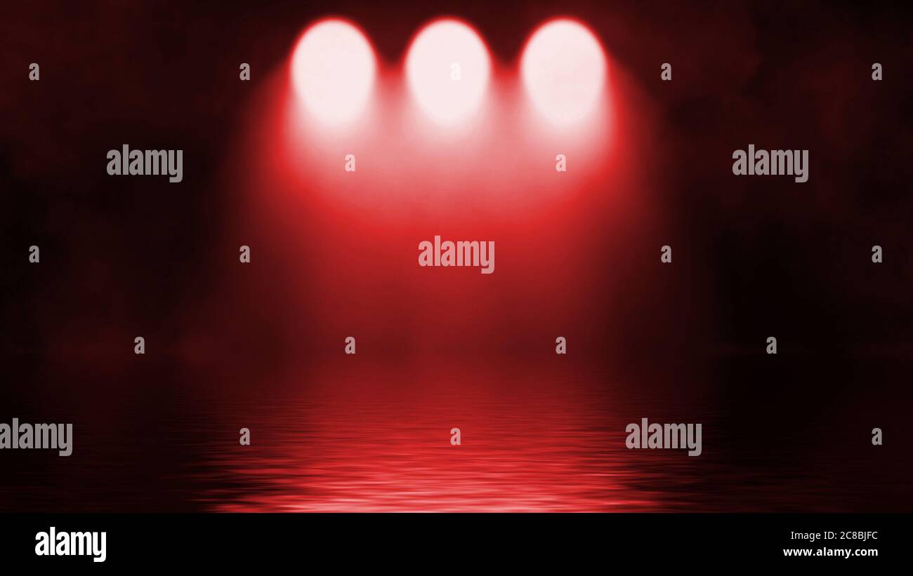 Amazing red studio spotlight . Stage with smoke reflection in water ...