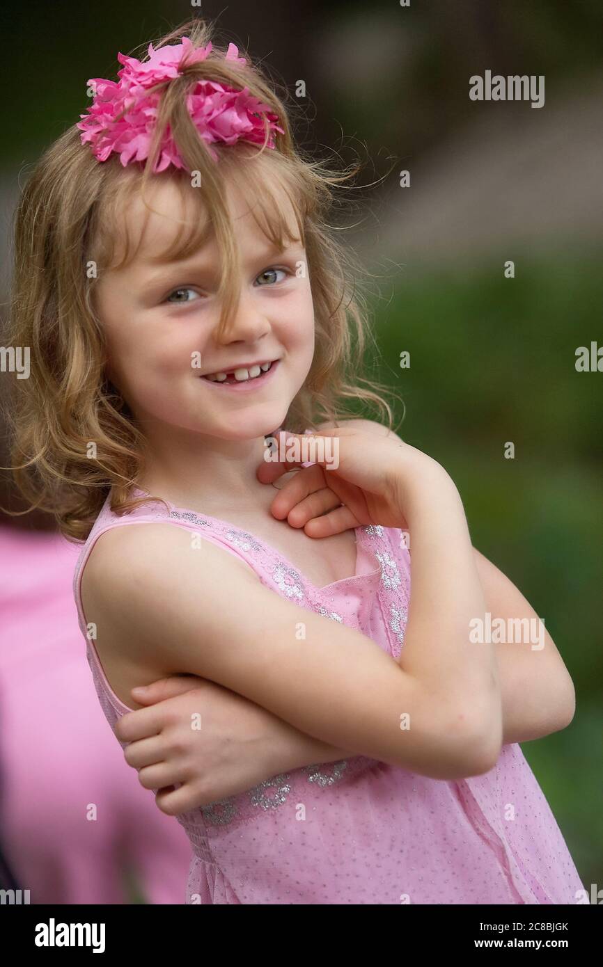 Little blonde girl posing Stock Photo - Alamy