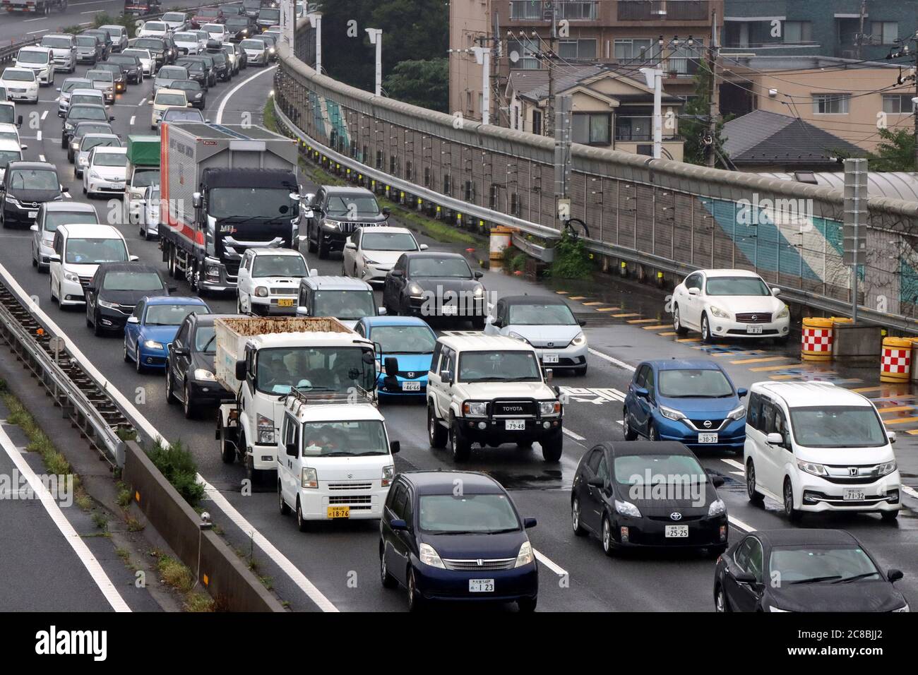 Tokyo, Japan. 23rd July, 2020. Motorists are caught in a traffic jam ...