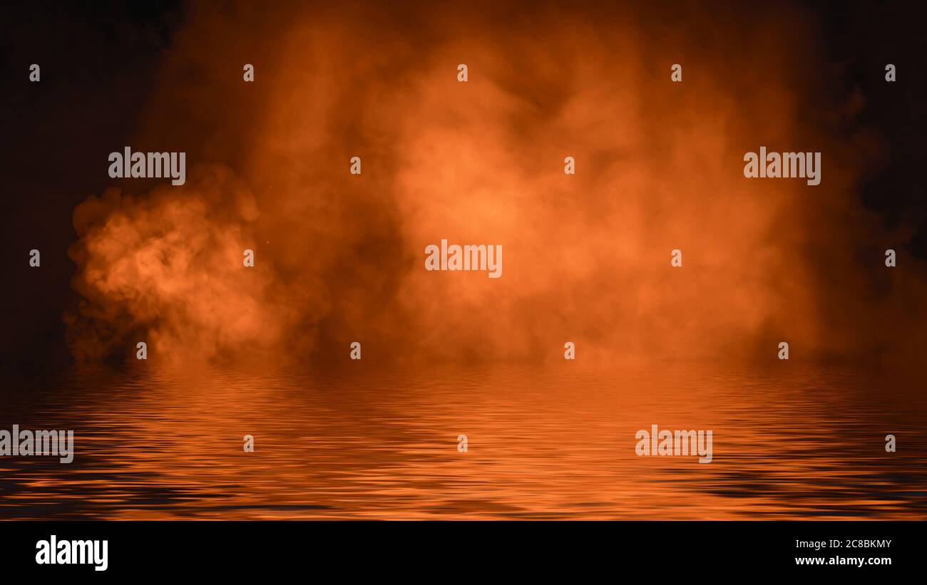 Abstract orange smoke with reflection in water .Lighting spotlighting ...