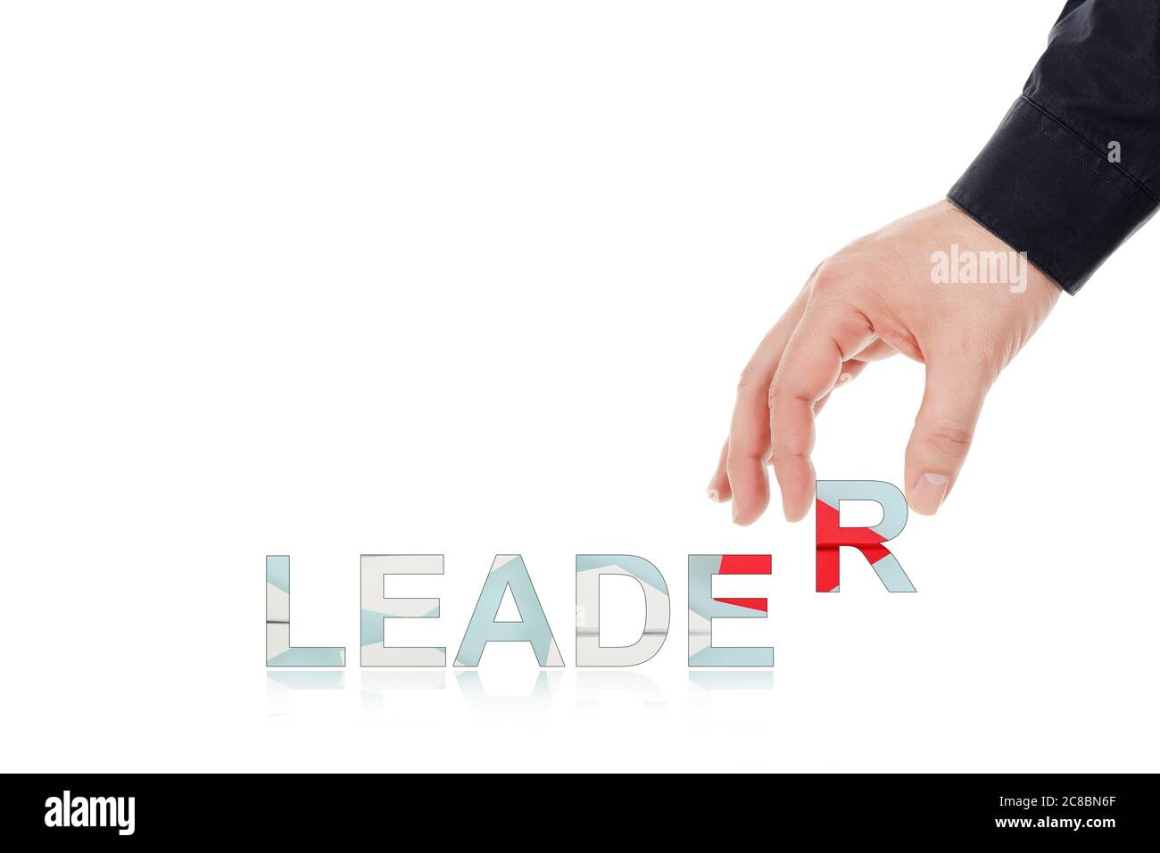male hand placing letters to form the word leader Stock Photo - Alamy