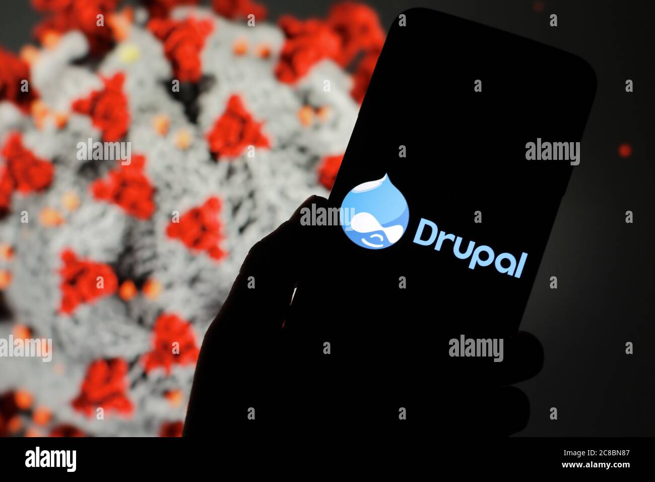 In this photo illustration a Drupal app logo seen displayed on a ...