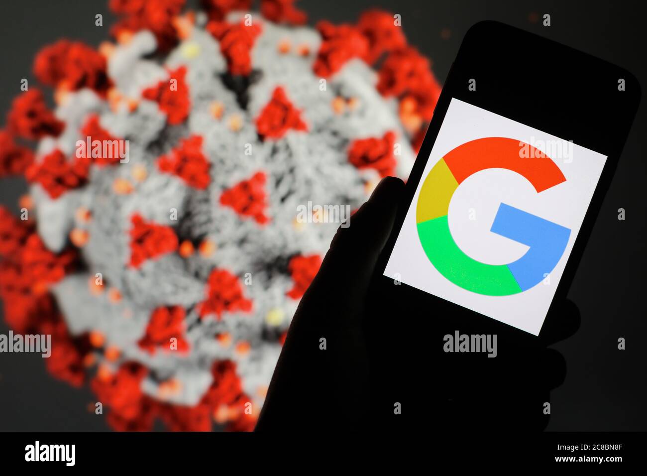 In this photo illustration a Google company logo seen displayed on a ...
