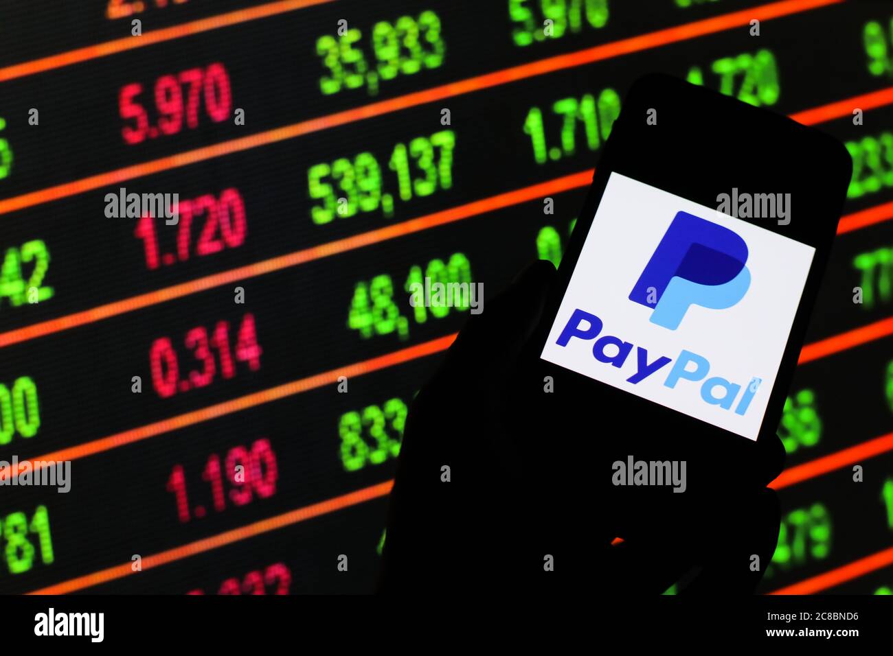 In this photo illustration a PayPal logo seen displayed on a smartphone ...