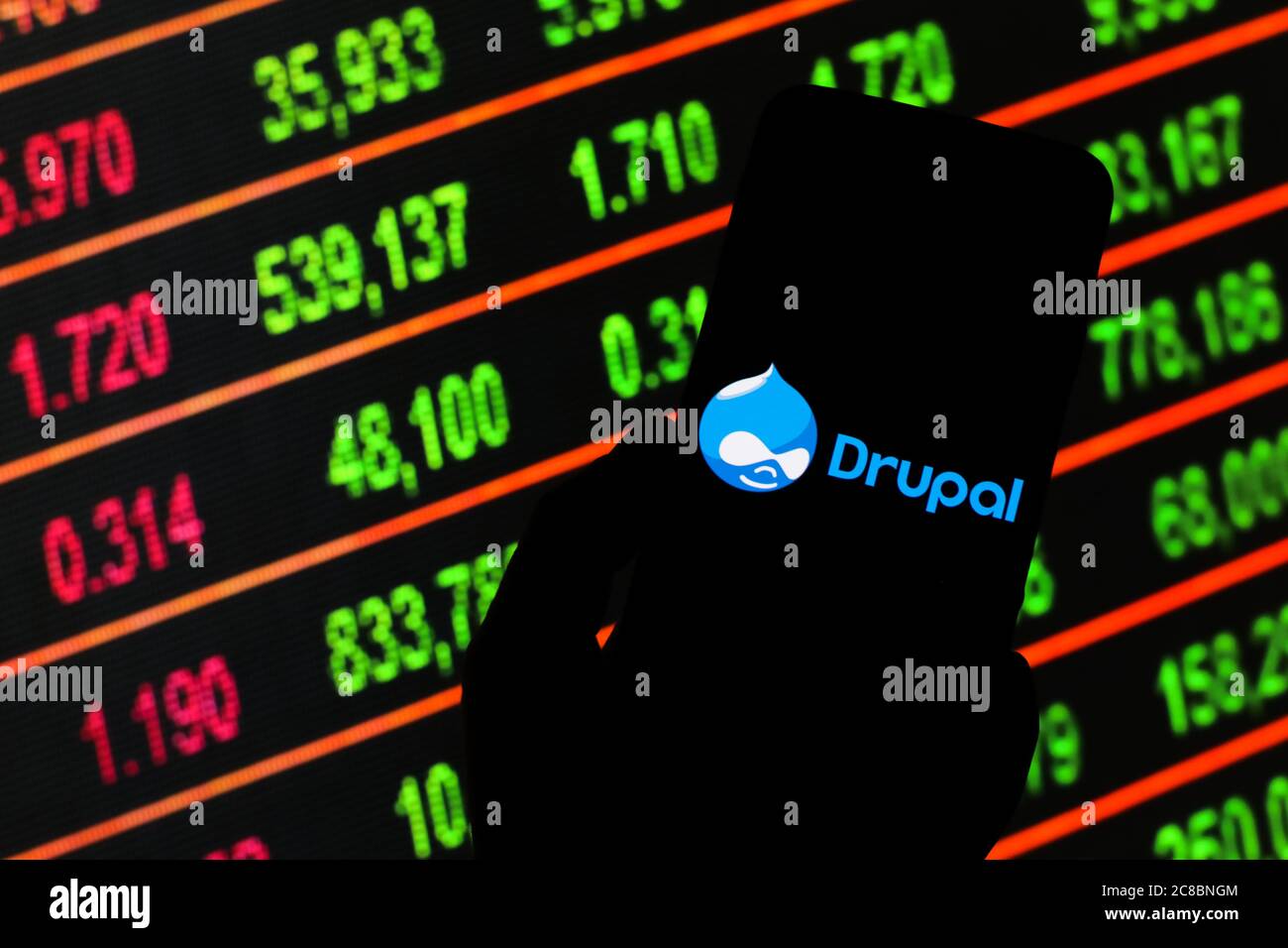 In this photo illustration a Drupal logo seen displayed on a smartphone ...