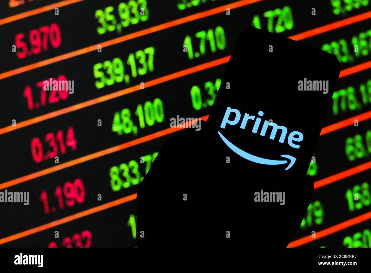 In this photo illustration an Amazon Prime logo seen displayed on a ...