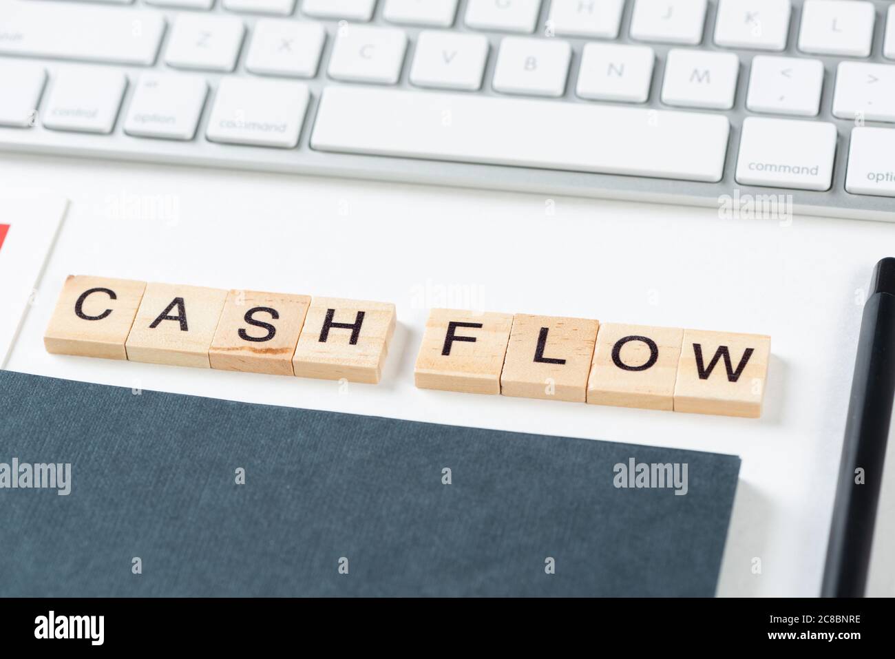 Cash flow statement concept with letters on cubes Stock Photo - Alamy