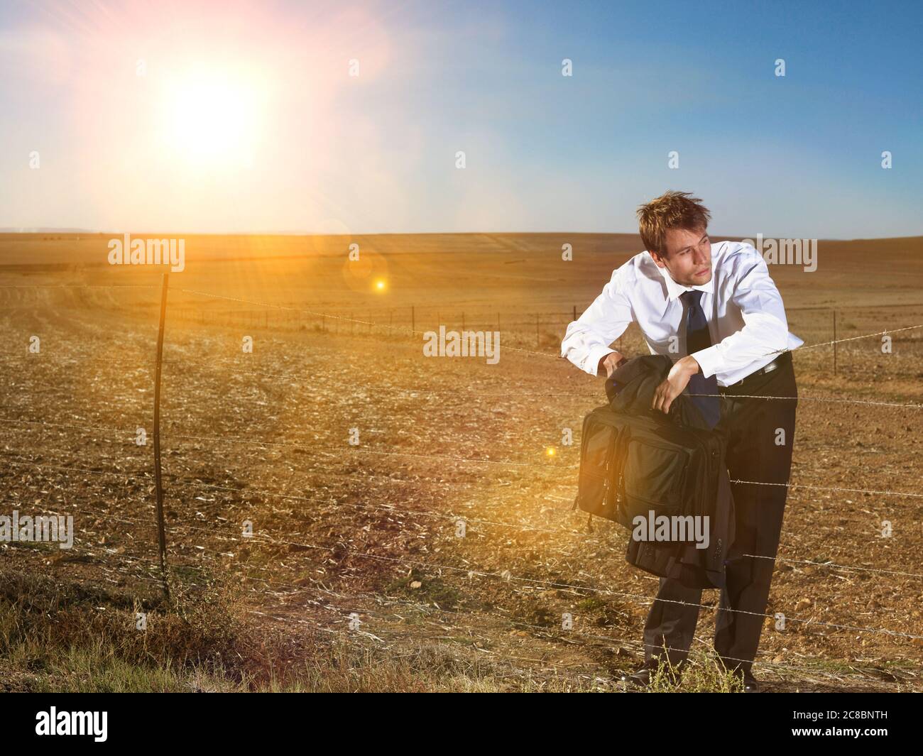 Stranded man in suit hi-res stock photography and images - Alamy