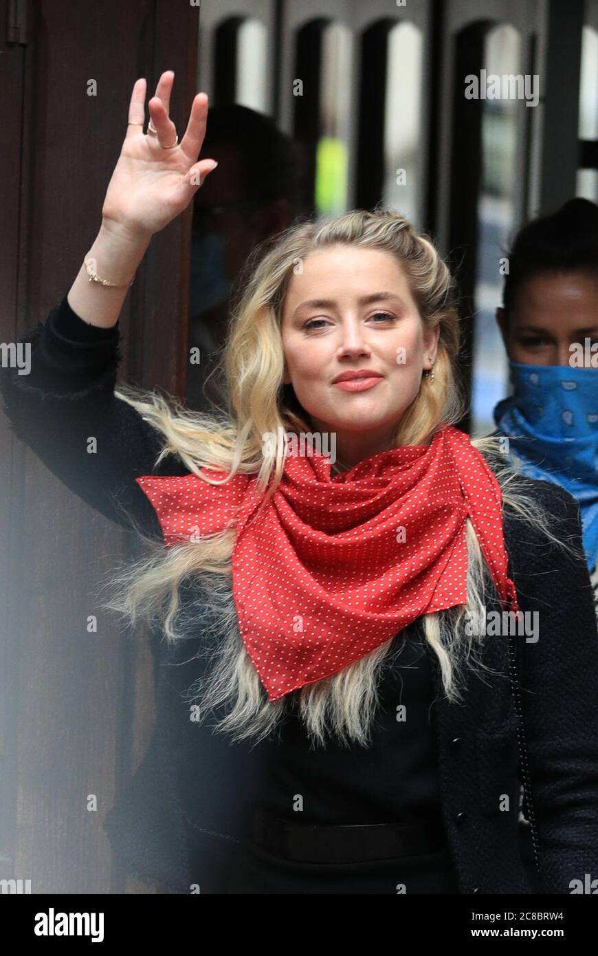 Actress Amber Heard arrives at the High Court in London for a hearing ...