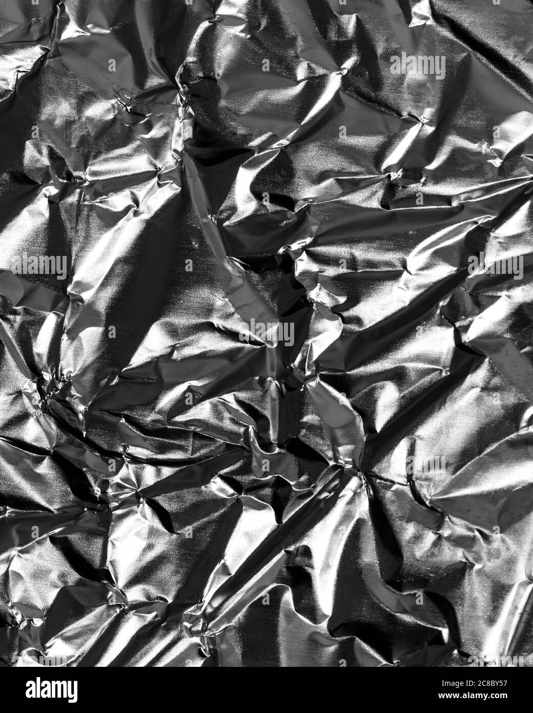 Texture crumpled foil golden Black and White Stock Photos & Images - Alamy