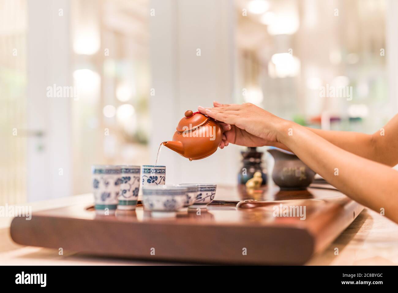 Woman serving Chinese tea in a tea ceremony. China tea ceremony Stock ...