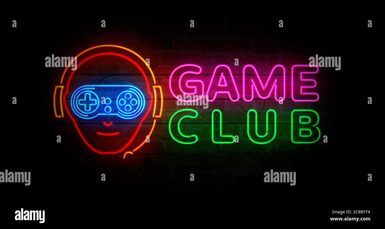 Game club with gamer symbol neon symbol on brick wall. Light bulbs with ...