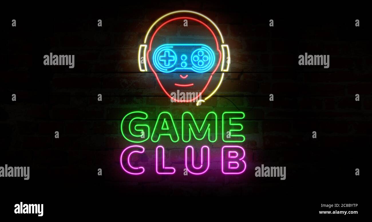 Game club with gamer symbol neon symbol on brick wall. Light bulbs with ...