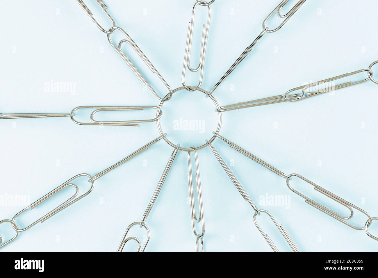 paper clips as chain linked to ring, abstract unity concept Stock Photo ...