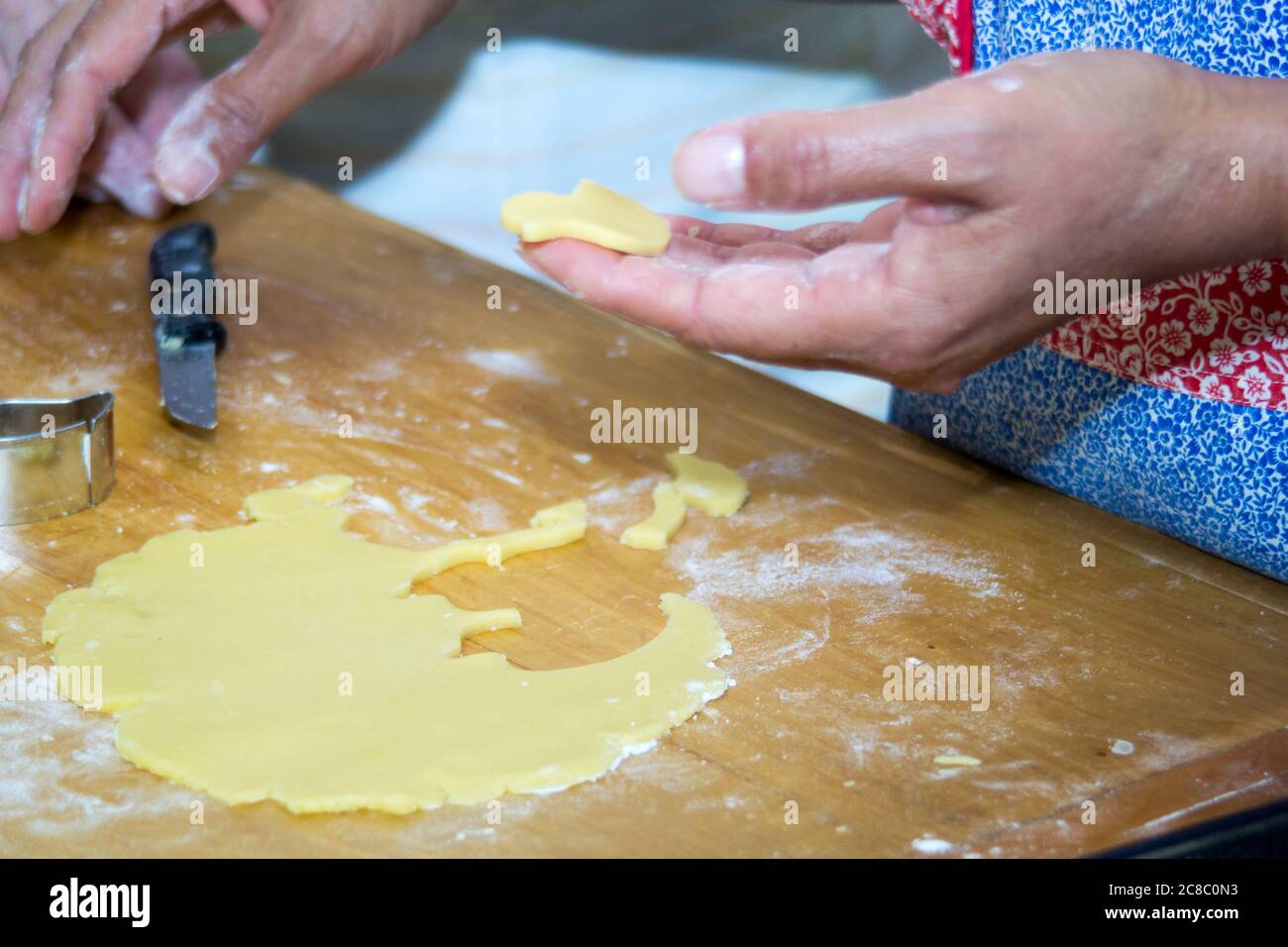 Woman baking biscuits hi-res stock photography and images - Alamy