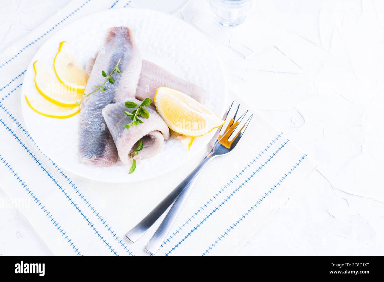 Dutch herring. Traditional Dutch food, marinated fish fillet with onion ...