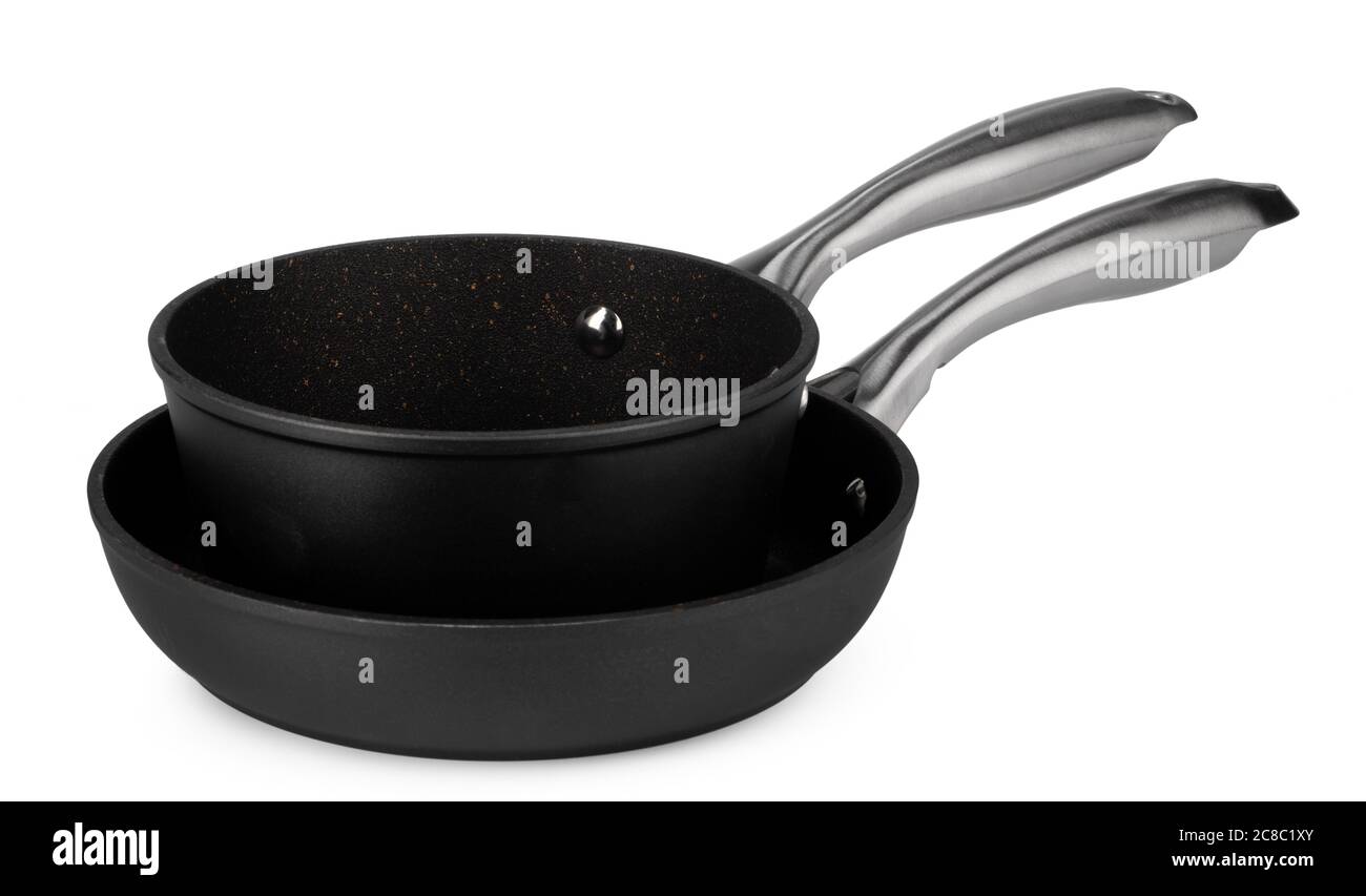 Set of new black pans isolated on white Stock Photo - Alamy