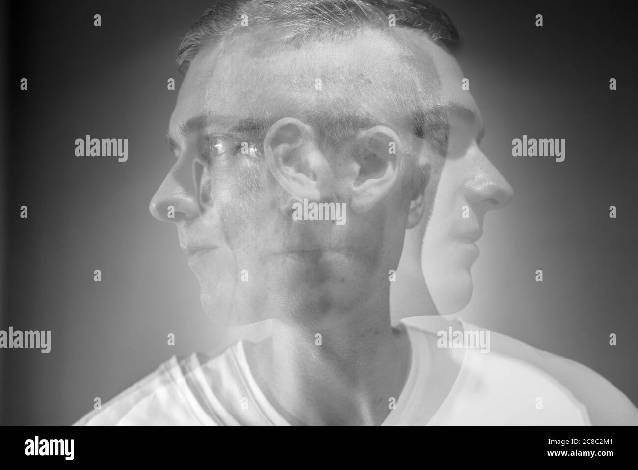 Young man with double exposure effect in black and white Stock Photo ...