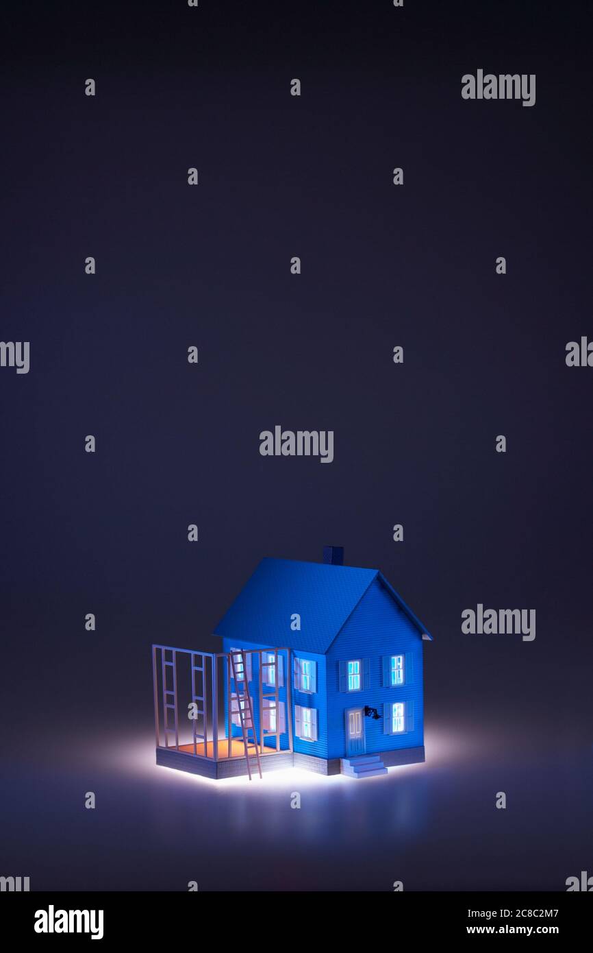 Illuminated model of house Stock Photo - Alamy