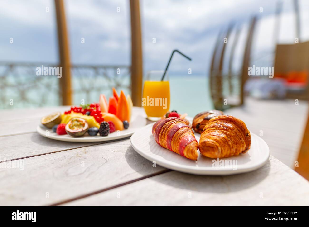 Delicious organic fruits, eggs, juice and coffee served for breakfast ...