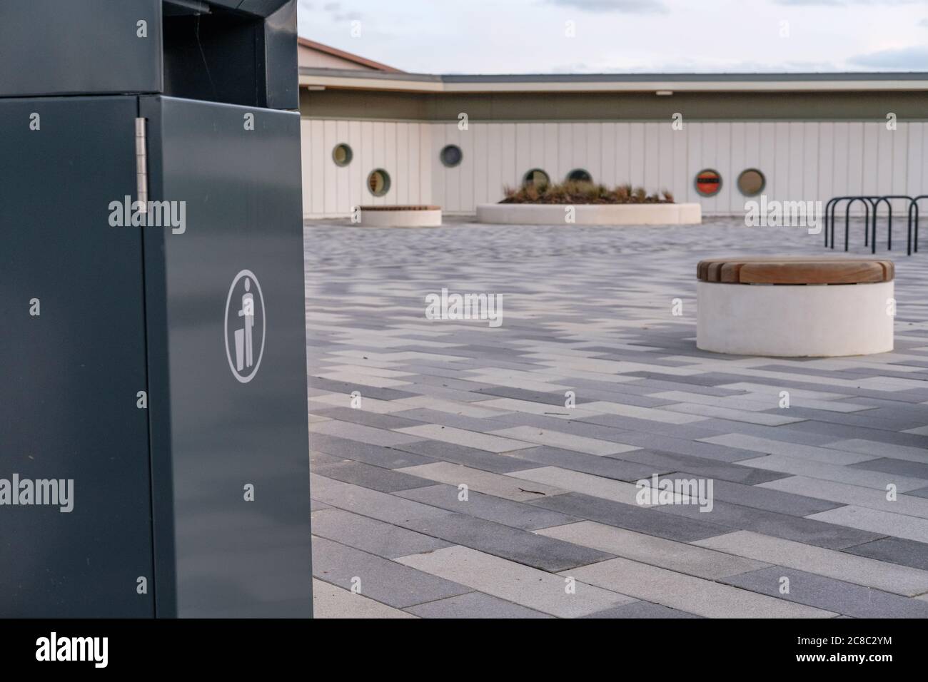 Public waste bin seen near a newly built community and education centre ...