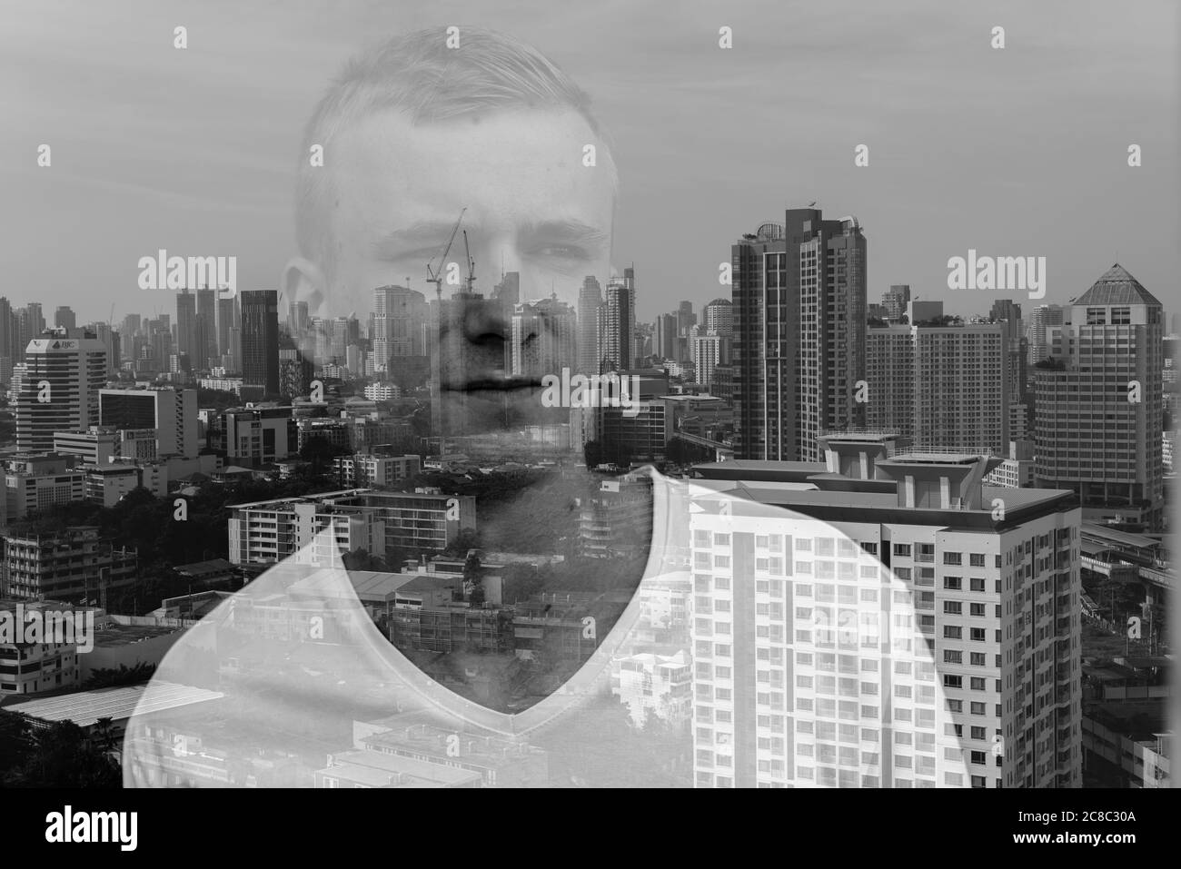 Young man with double exposure effect in black and white Stock Photo ...