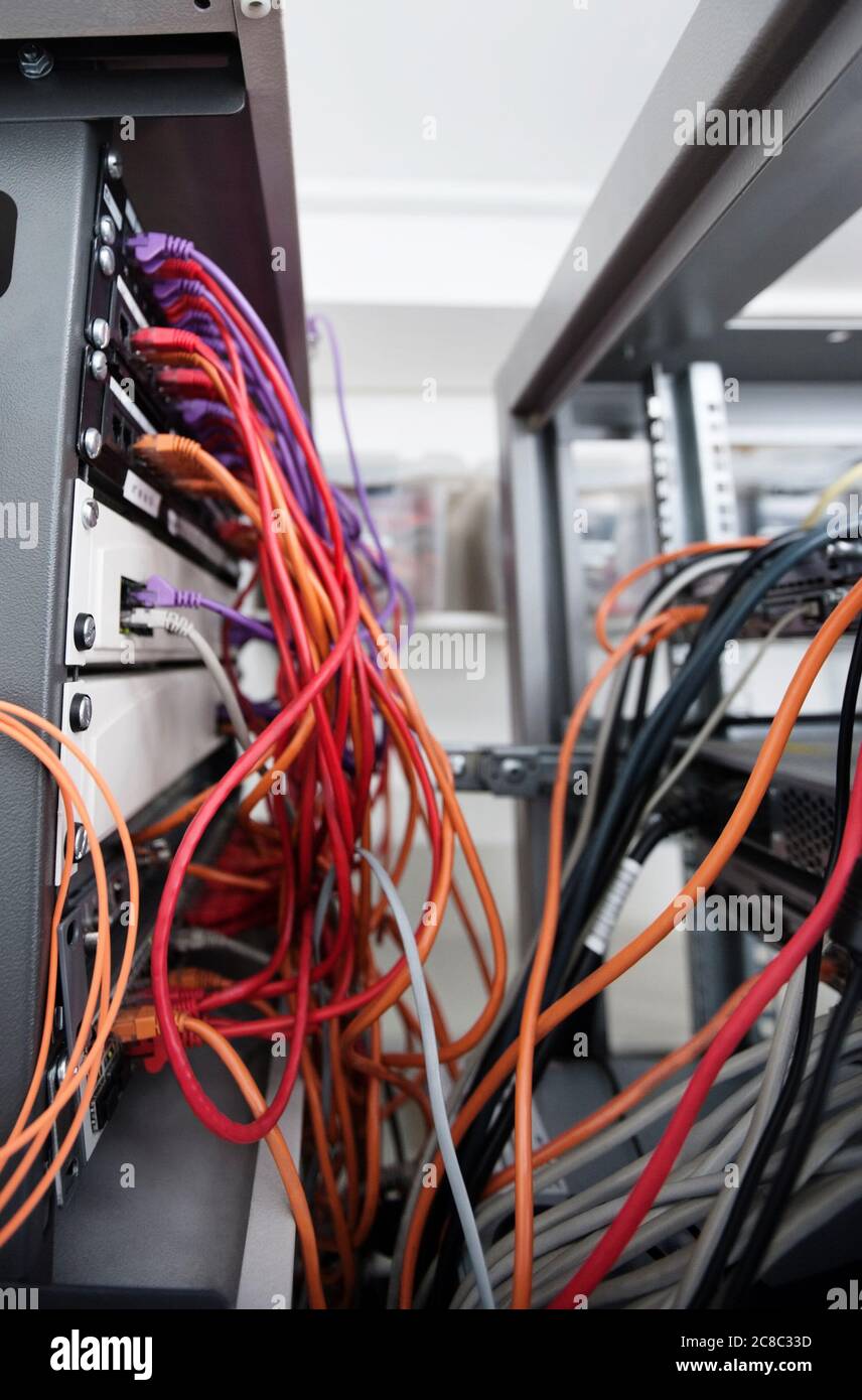 Messy cables in computer data center Stock Photo - Alamy