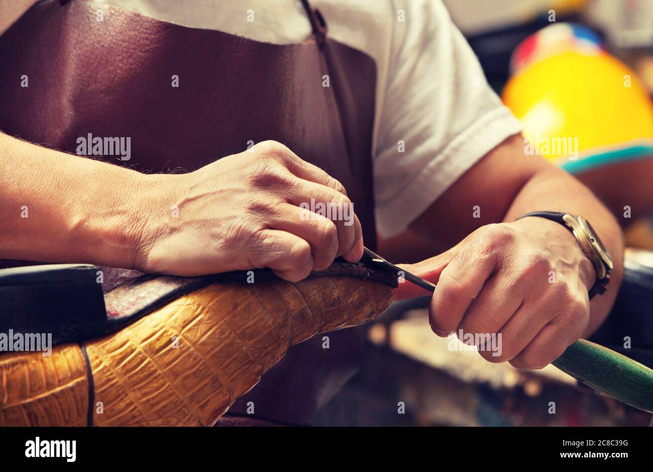 Cobbler fixing shoe hi-res stock photography and images - Alamy