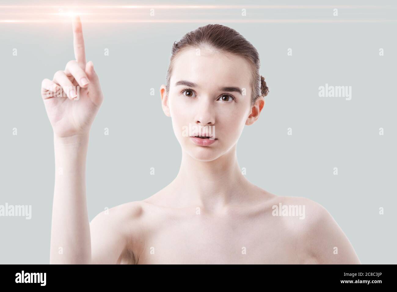 Attractive caucasian woman touching interactive screen Stock Photo - Alamy