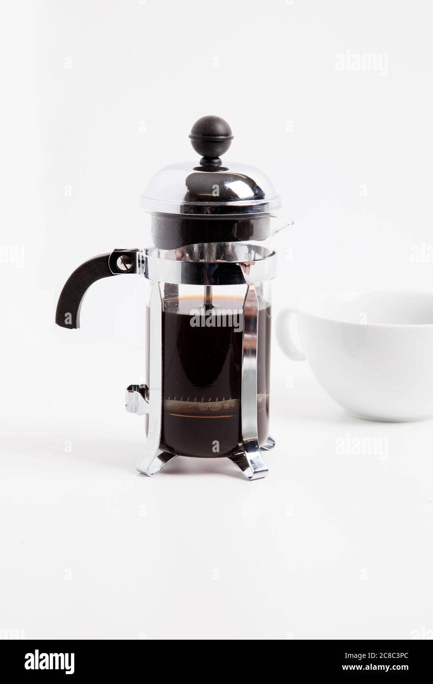 Cafetiere and cup Stock Photo - Alamy