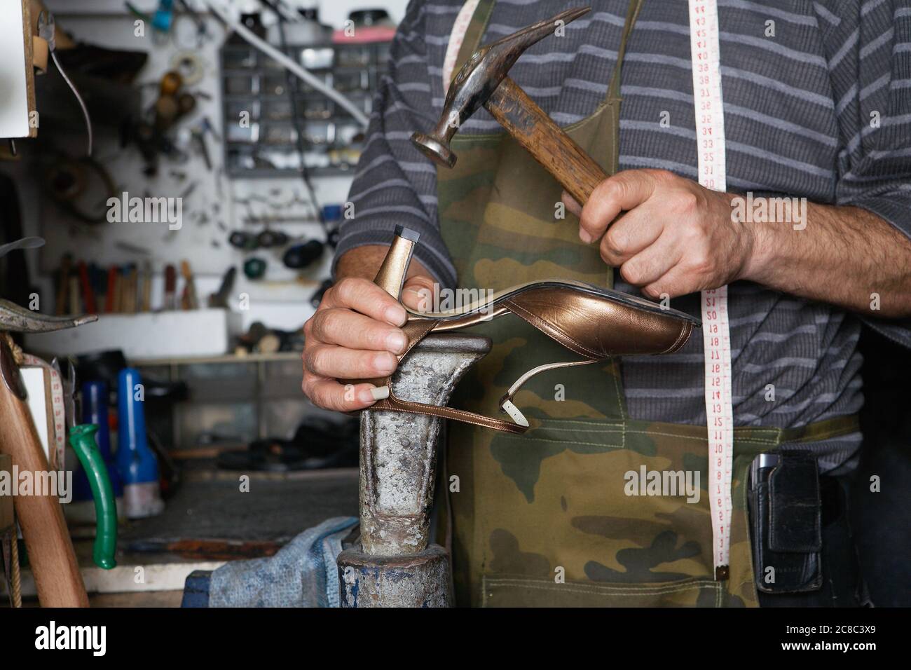 Shoemaker Repairing High Heel Shoe Stock Photo - Alamy