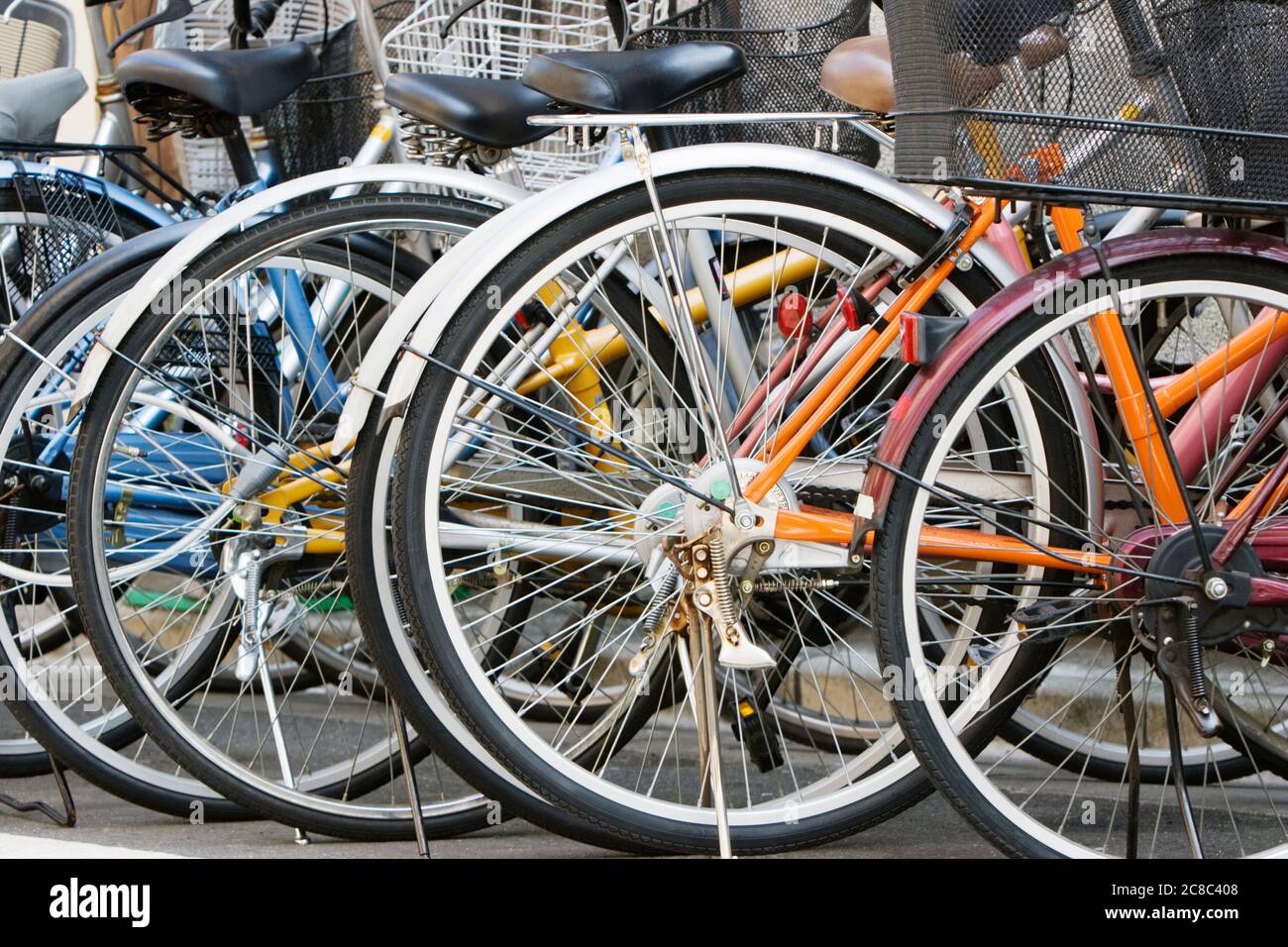 Parked Bicycles all together Stock Photo - Alamy
