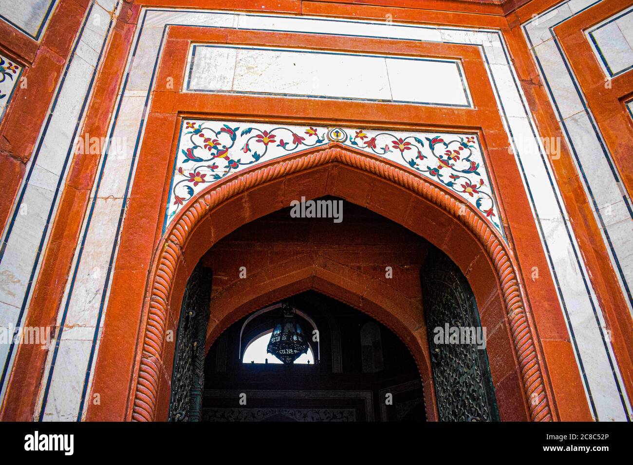 Architecture of entry gate and tomb inside for prayer at Taj Mahal. Taj ...