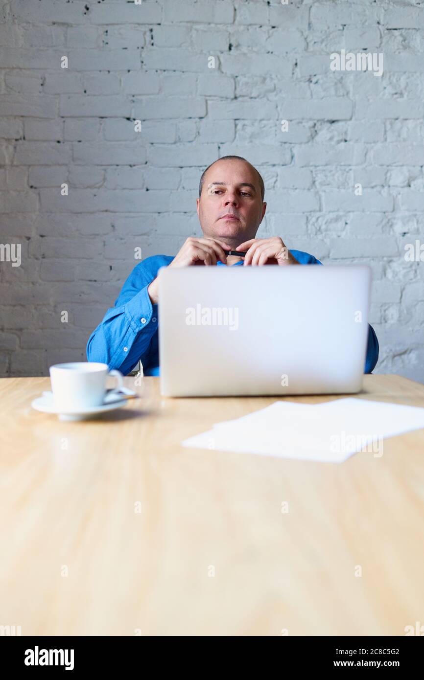 Male business director sitting hi-res stock photography and images - Alamy