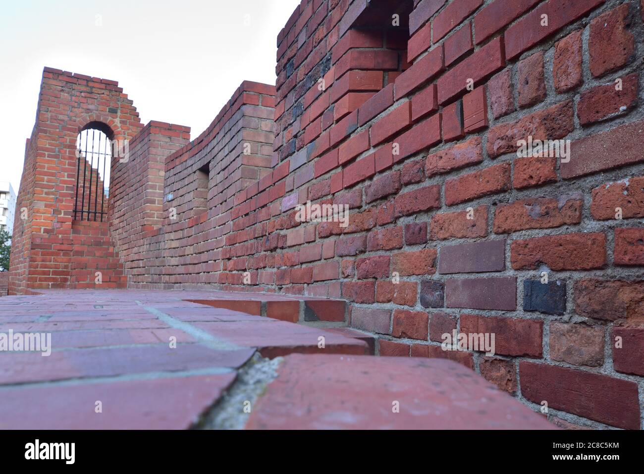 The historic defense walls of the Barbican in Warsaw's Old Town during ...