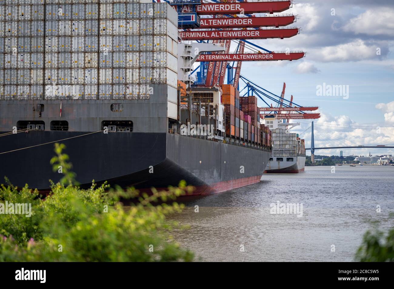 A container ships in the harbor of Hamburg, Germany Stock Photo - Alamy