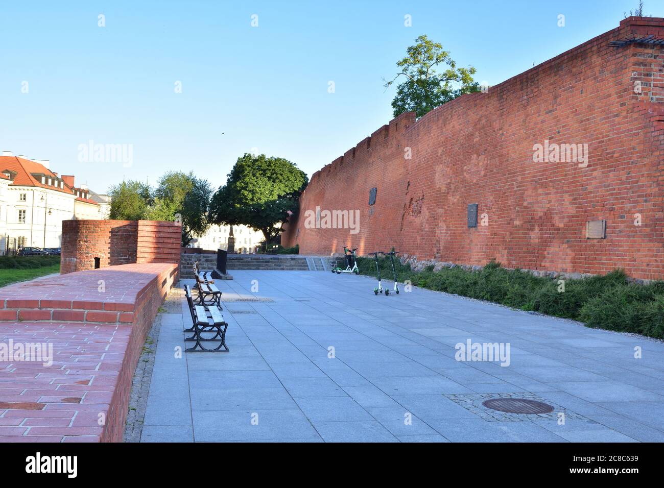 The historic defense walls of the Barbican in Warsaw's Old Town during ...